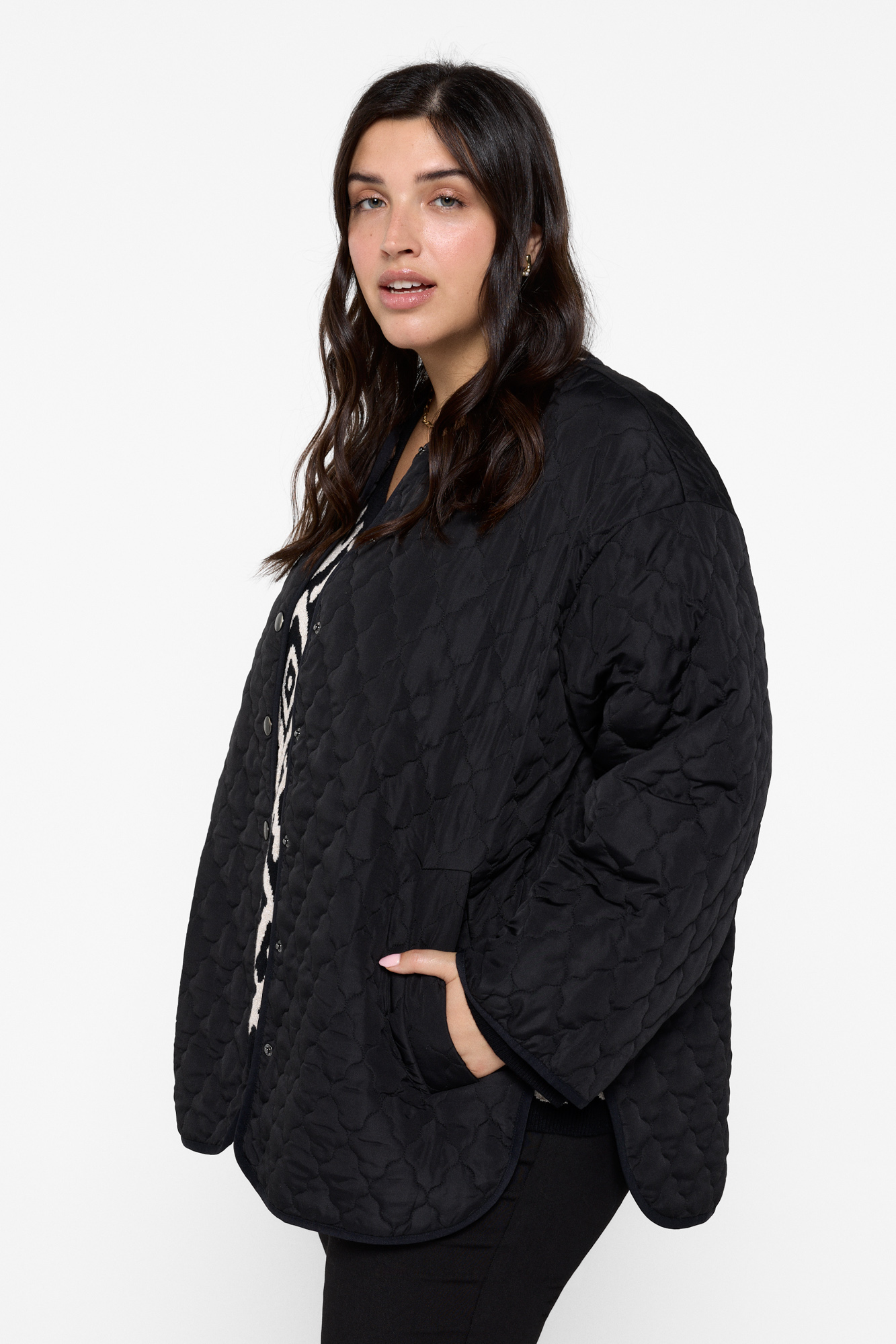 Curvy quilted coat | Women's coats and parkas | Cortefiel