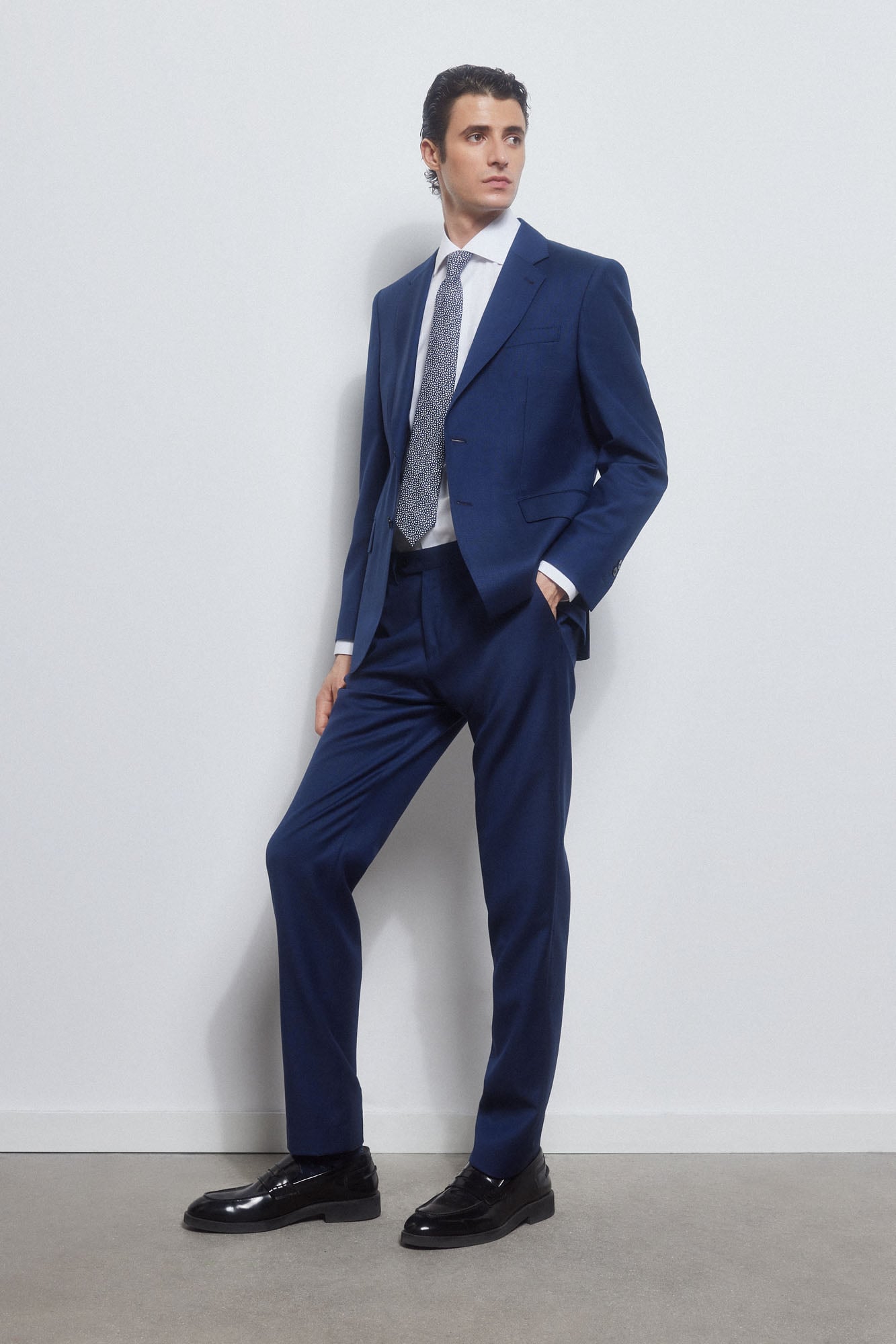 Blue slim fit bi-stretch trousers | Men's suits | Cortefiel